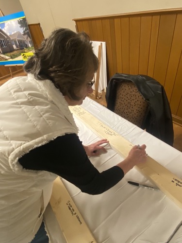 USI helps celebrate raising of second Building Homes and Health home ...